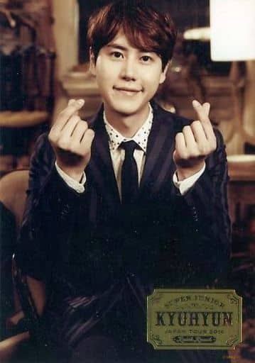 SUPER JUNIOR / KYUHYUN / upper body, suit, sitting in chair, lifting ...